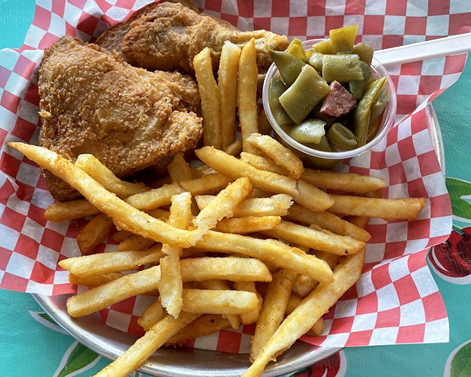 Perfectly fried chicken with golden fries and those magical green beans&mdash;a plate that says "diet starts tomorrow" in the most delicious way.