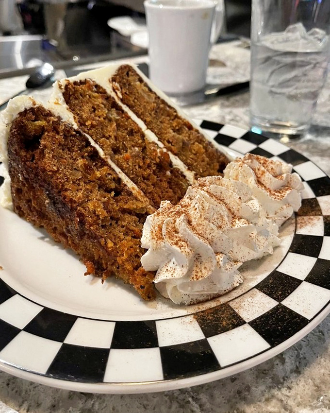 Carrot cake that defies gravity and expectations&mdash;moist layers stacked high with cream cheese frosting that makes you question why chocolate gets all the glory.