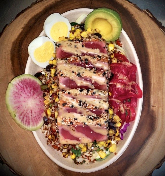The ahi tuna bowl—where healthy meets heavenly. That watermelon radish slice is the fashionable hat this dish wears to the culinary gala.