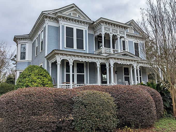 This stunning Victorian home with ornate white trim and baby blue siding could make a B&B enthusiast weep with joy.