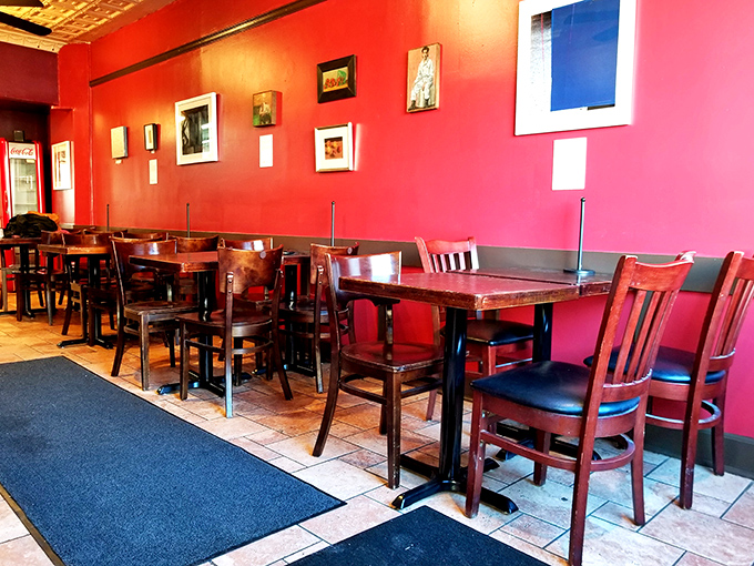 Simple tables, red walls, and the promise of meat-induced happiness. Mike's dining room says "get comfortable, you'll be here awhile."