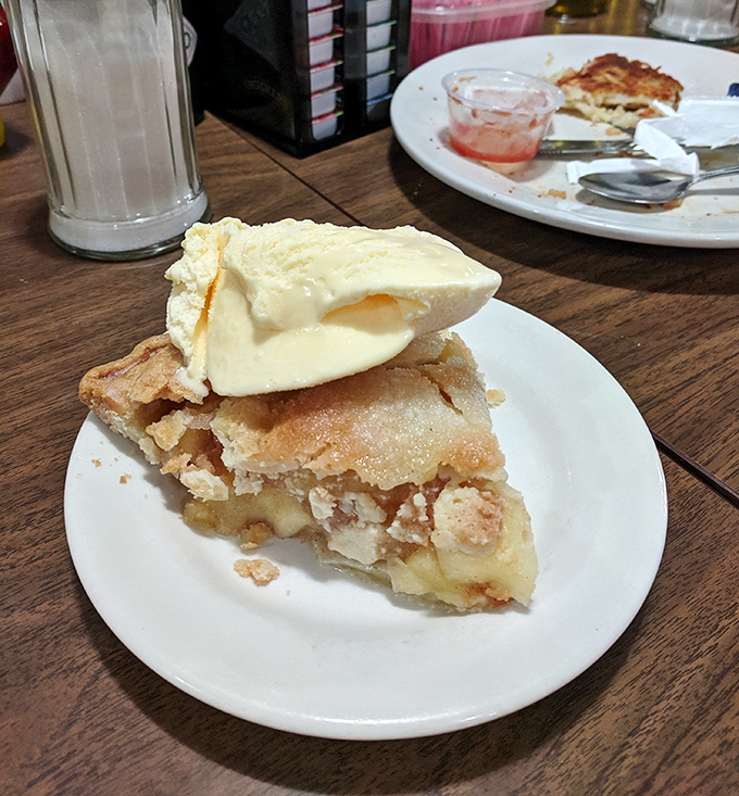Apple pie &agrave; la mode &ndash; the ultimate comfort food finale. That scoop of ice cream melting into warm pie is poetry on a plate.