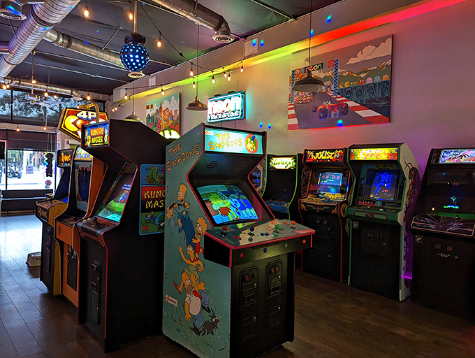 Classic cabinets await their next challenger, standing tall like old friends who never forgot your birthday or high score.