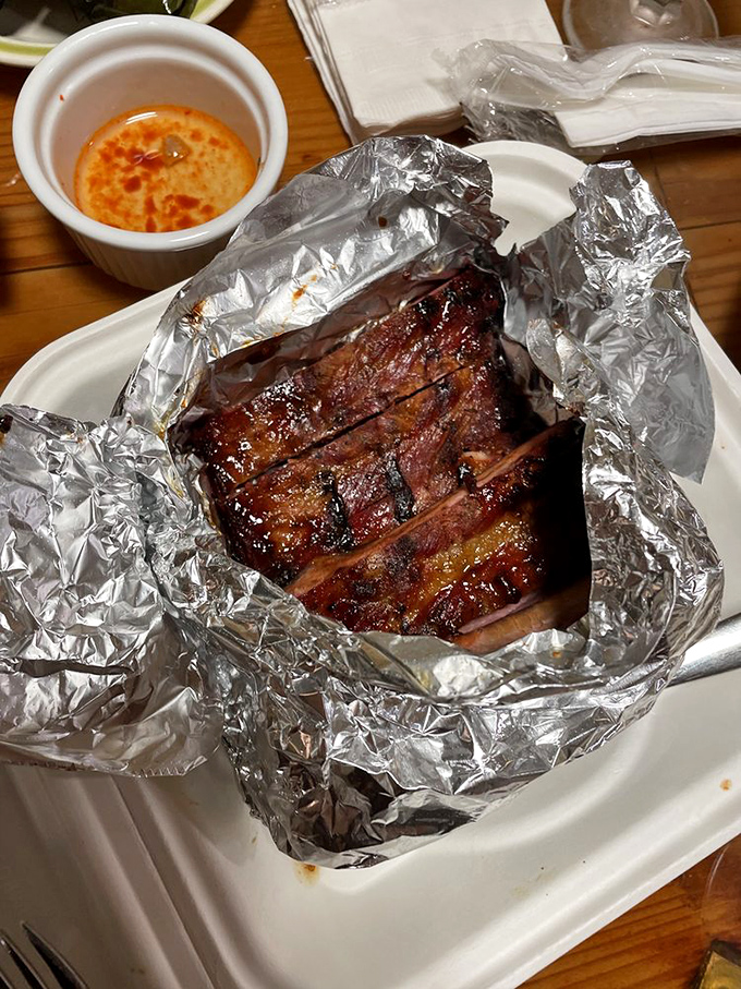 Ribs that glisten with a lacquered finish&mdash;the kind that make you temporarily forget table manners exist.