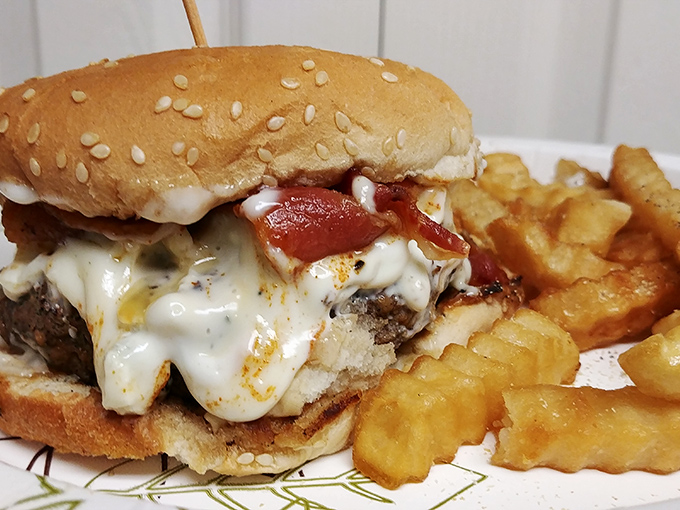 This bacon cheeseburger isn't just a meal, it's a masterpiece. The melty cheese waterfall alone deserves its own Florida postcard. 