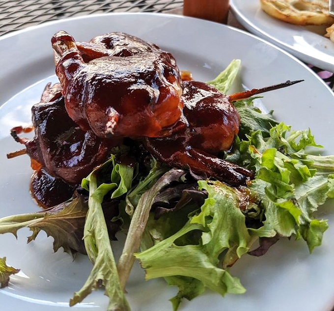 These bacon-wrapped shrimp perched atop fresh greens look like they're auditioning for a food magazine cover&mdash;and getting the job on the first try. 