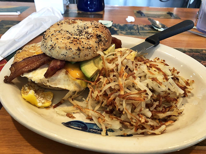 The breakfast sandwich that answers the eternal question: "Why choose between bacon, egg, and cheese when you can have all three?"