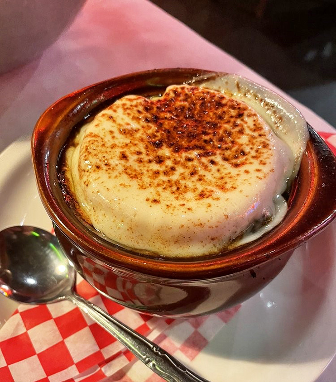French onion soup with a cheese cap that stretches like a yoga instructor. Breaking through is half the fun.