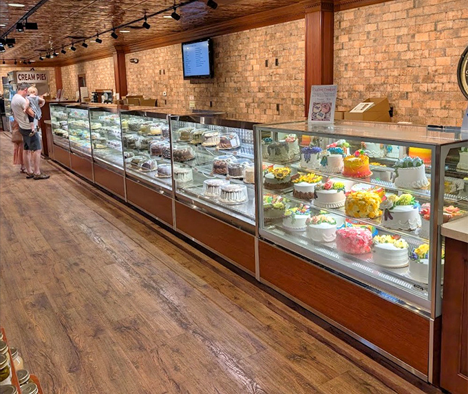 A glass case of temptation displaying cakes and pies that make grocery store bakeries hang their heads in shame.