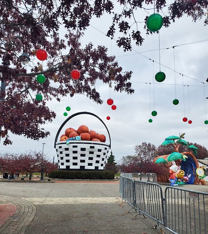 Holiday decorations add festive flair to the basket's already impressive presence, with colorful ornaments dancing overhead like jubilant fruit.