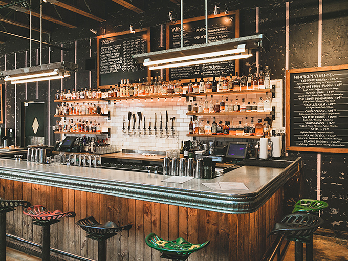 A whiskey selection that would make bourbon country proud, displayed with the reverence these bottles deserve. Your barbecue just found its soulmate.