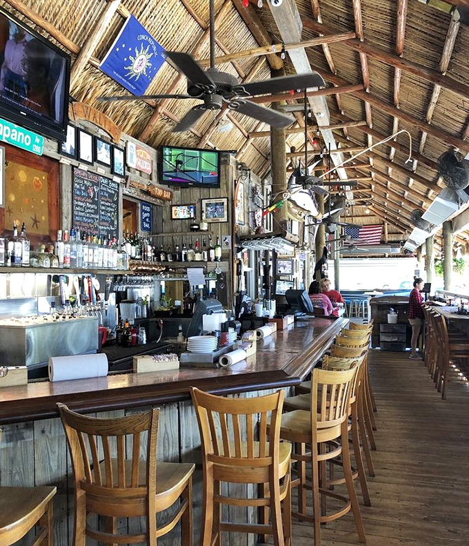The tiki bar's wooden beams and thatched ceiling create the perfect Florida atmosphere &ndash; like dining in a shipwreck that's been tastefully redecorated.