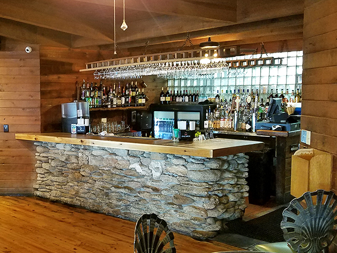 The stone-fronted bar looks like it was built by seafaring pirates who decided mixing drinks was more profitable than plundering ships.