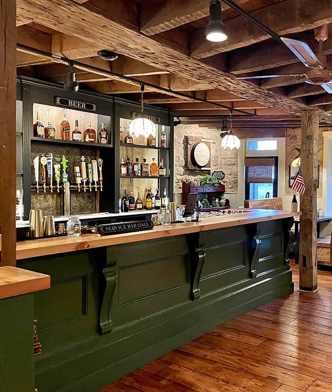 A bar that balances rustic charm with serious spirits. Those wooden beams have witnessed countless toasts to Pennsylvania evenings.