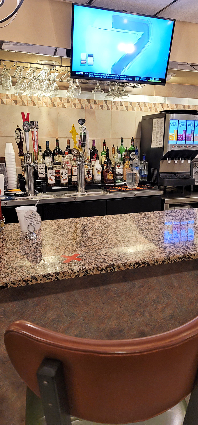 A fully stocked bar that says, "Yes, you can have a Manhattan with your meatloaf"&mdash;because sometimes adulting deserves a reward.