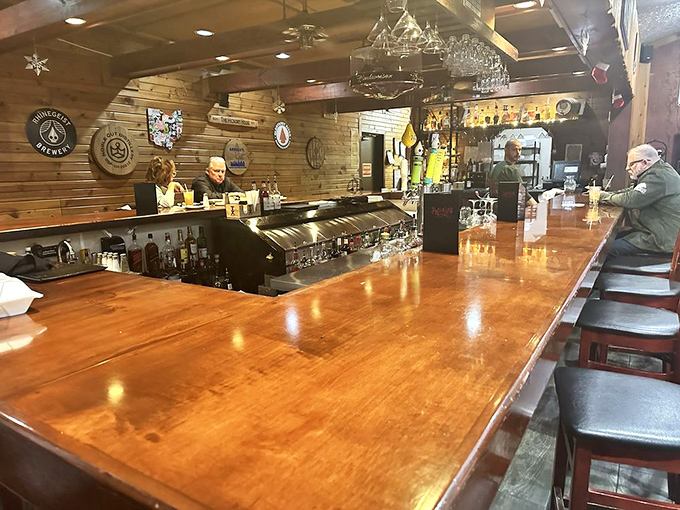 The bar – where strangers become friends and friends become family over perfectly mixed Old Fashioneds and tales of steaks past.