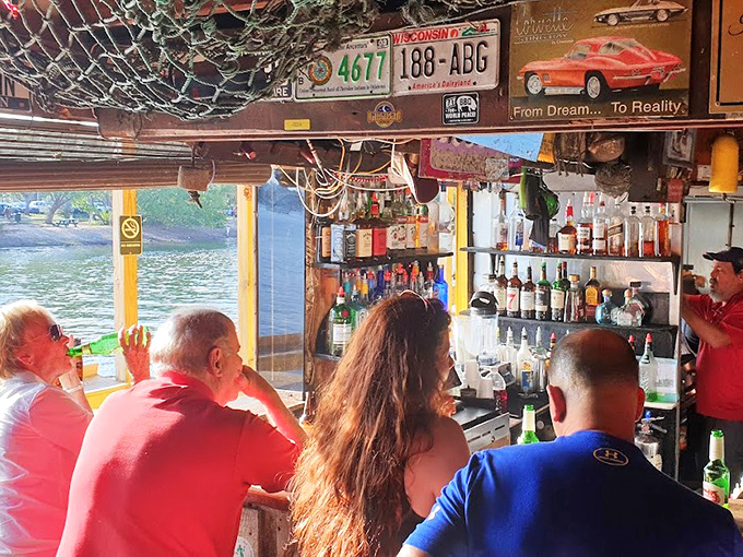 The bar looks like it was assembled from driftwood and maritime salvage, yet somehow manages to serve up perfect cocktails with Florida flair.