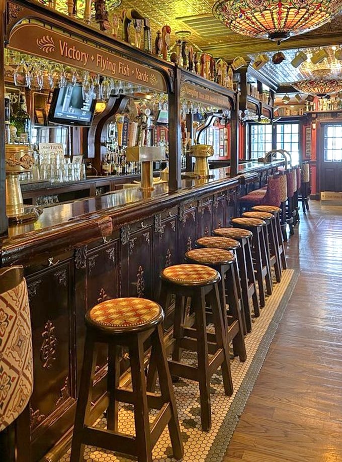 A bar that understands the art of anticipation. Those stools have supported decades of stories, celebrations, and "I'll have what she's having" moments.