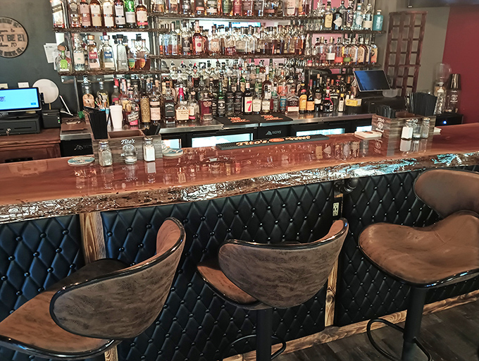 A bourbon selection that would make Kentucky jealous, displayed with the reverence these amber treasures deserve.