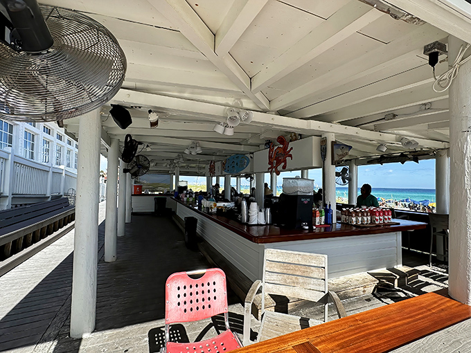 The outdoor bar brings new meaning to "drinks with a view"—where bartenders mix cocktails to the soundtrack of crashing waves.