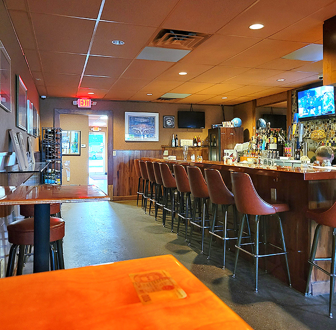 The bar area &ndash; where solo diners find community, sports fans find camaraderie, and everyone finds a good pour without pretentious mixology.