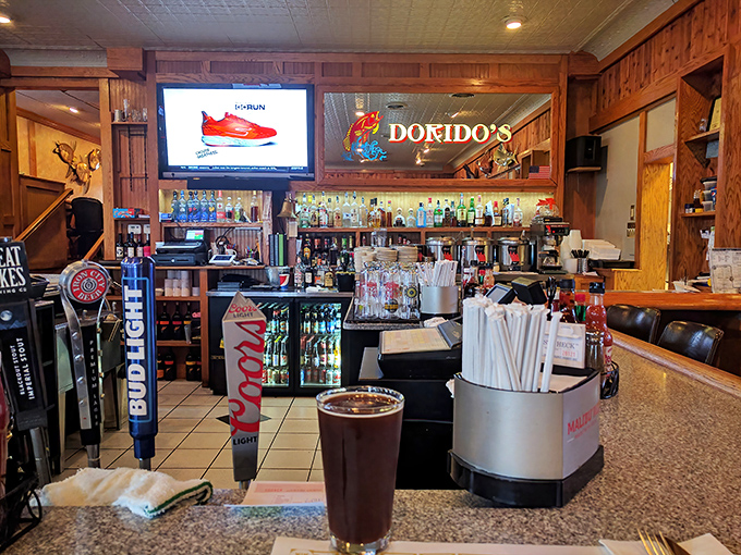 The bar area balances the line between neighborhood watering hole and serious cocktail spot, with enough bottles to weather any storm.