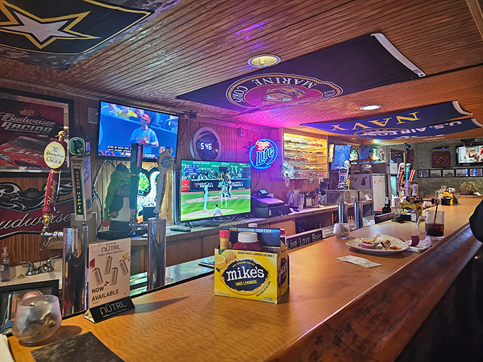 The bar area glows with neon signs and sports on TV&mdash;a community watering hole where everybody might not know your name yet, but they will by dessert.