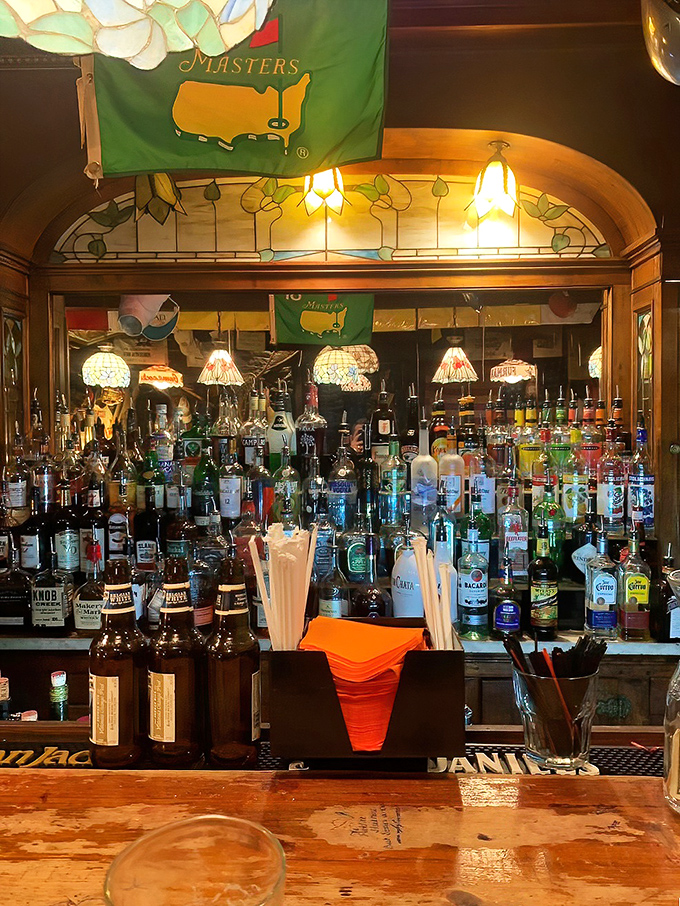 The bar area boasts enough spirits to raise your spirits, with stained glass that makes even ordering a drink feel special.