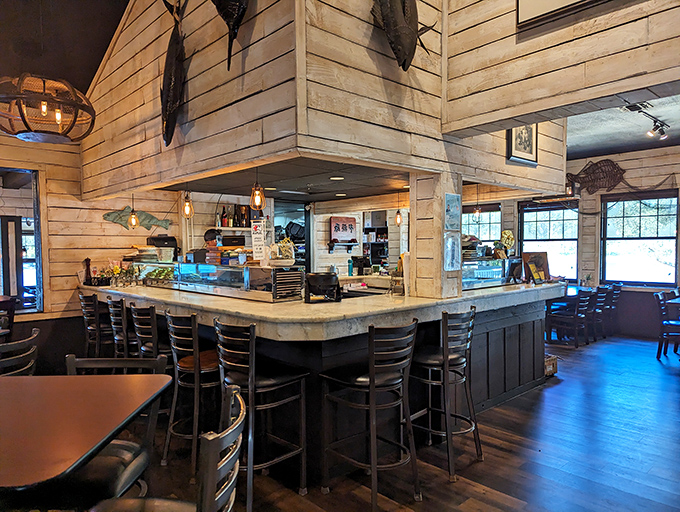 The bar area where friendly faces serve up both liquid refreshment and the kind of hospitality that warms hearts.