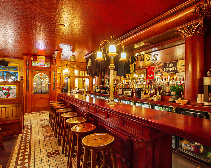 This isn't just a bar&mdash;it's a cathedral of conviviality where the polished wood has absorbed decades of laughter, secrets, and the occasional spilled Guinness.