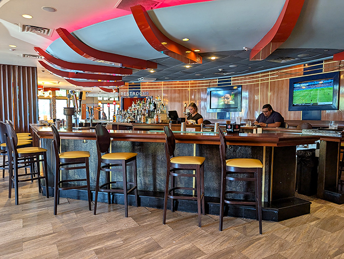 The bar area strikes that perfect balance between "I'm treating myself" and "I'm completely comfortable" &ndash; ideal for solo dining or meeting friends.