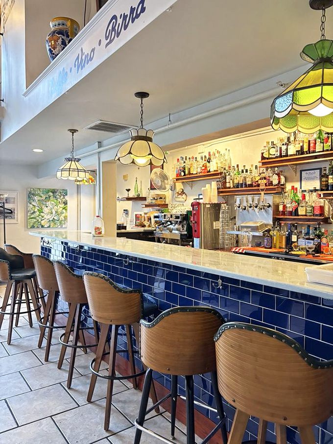 The bar area whispers "aperitivo hour" with its blue tile front and vintage-inspired lighting &ndash; Negronis practically mix themselves here.