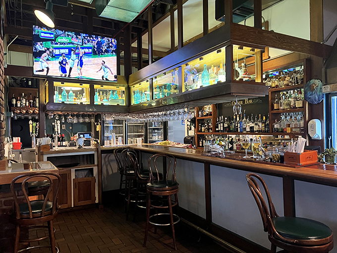 The bar area isn't just serving drinks; it's offering front-row seats to craftsmanship, with enough spirits to make any seafaring captain change course.