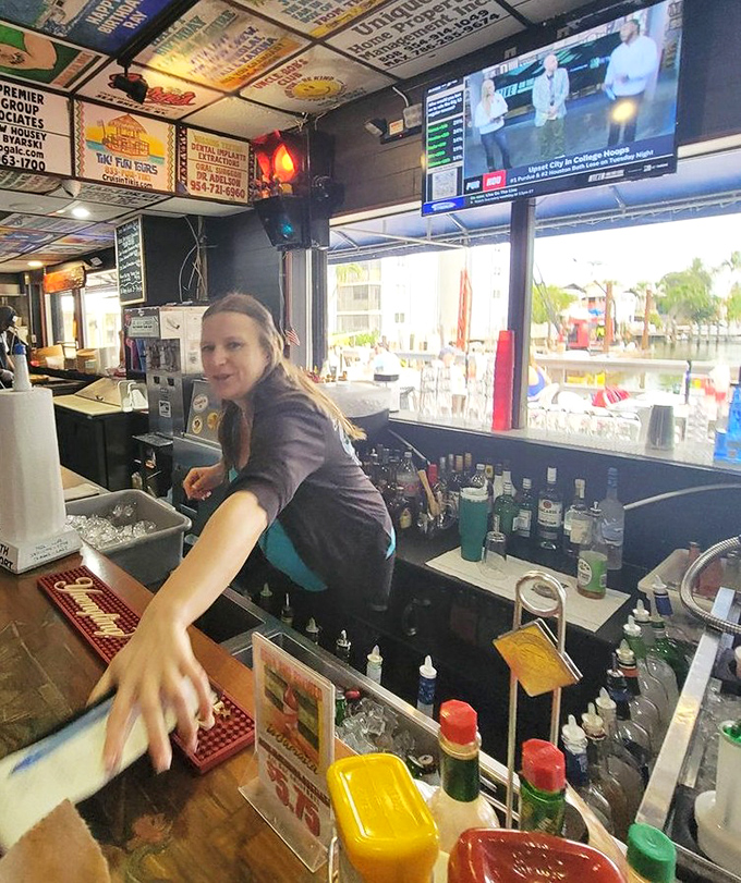 The bar where friendly faces pour cold drinks and local wisdom with equal generosity.