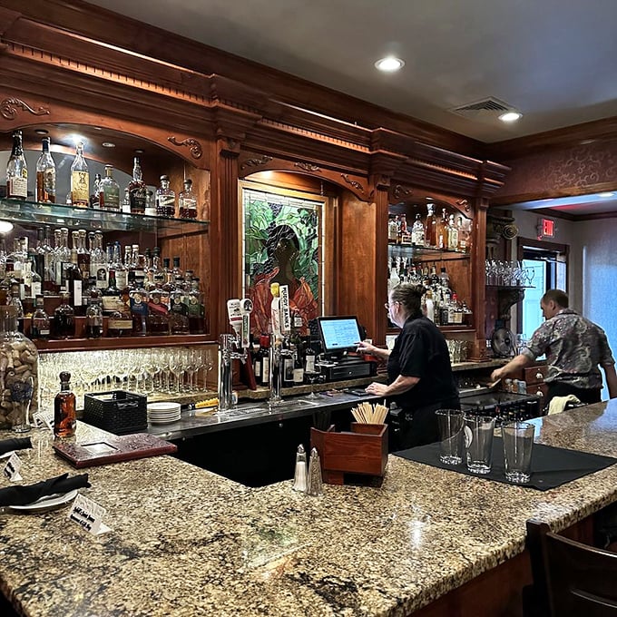 A bar that would make Don Draper feel right at home. Elegant woodwork, premium spirits, and bartenders who know the difference between mixing and crafting.
