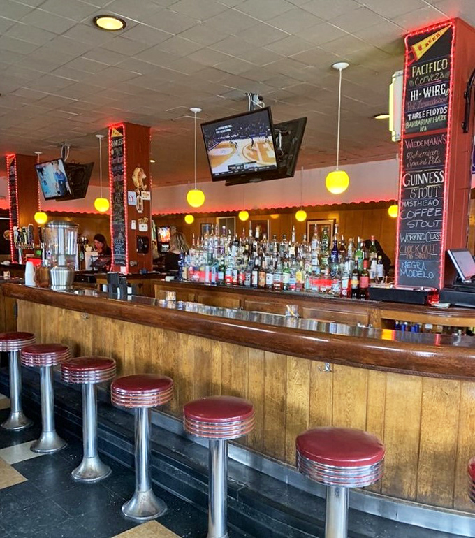 The bar doesn't just serve drinks; it serves as Cleveland's unofficial living room where strangers become friends over craft beers and hot dog debates.