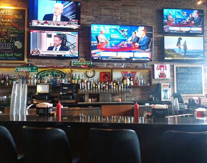 The bar at Dino's &ndash; where libations flow, sports commentary flourishes, and the debate over best wing sauce never ends.