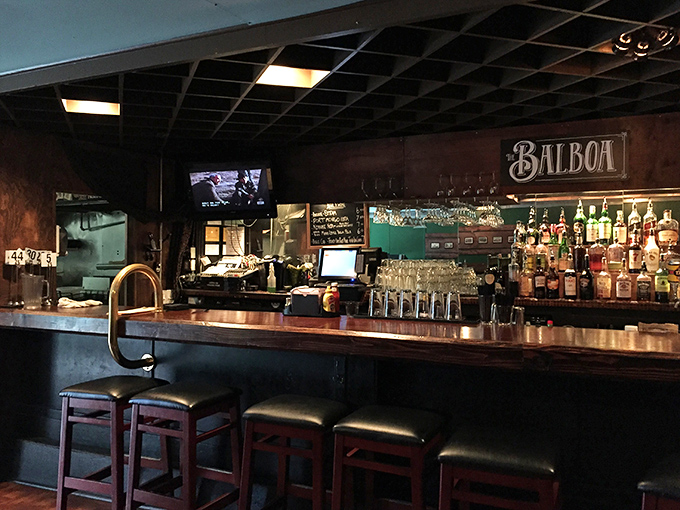 The bar area balances craft and comfort, where bartenders pour drinks with the confidence of people who know they're part of something special.