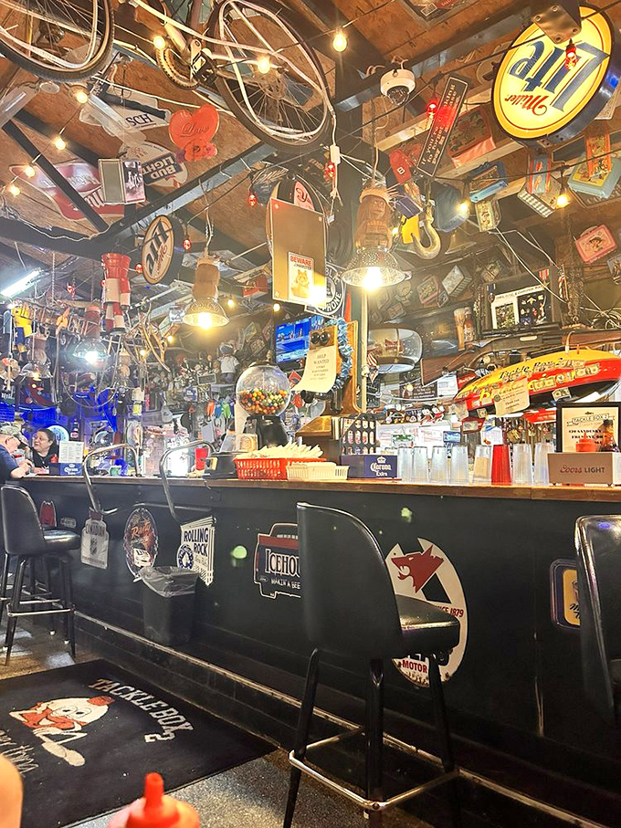 The bar area looks like the inside of a fisherman's memory box&mdash;if that fisherman collected every beer sign and knickknack since 1975.