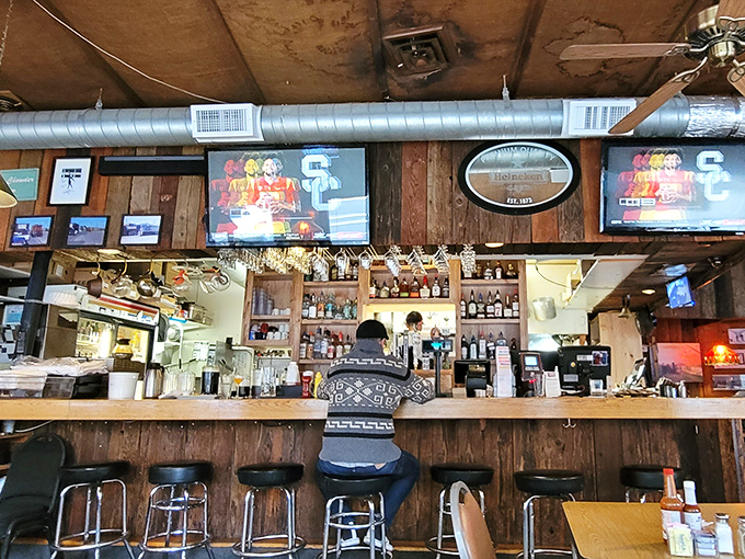 The bar area where breakfast and beverages coexist in perfect harmony, no questions asked.