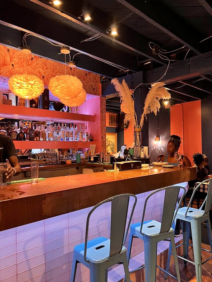 The bar doesn't whisper "good morning"&mdash;it announces it with fluffy pendant lights and a coral backdrop that wakes you up before the caffeine does.