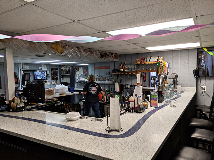 The bar area has that lived-in charm that says, "Many good stories and cold beers have been shared right here."
