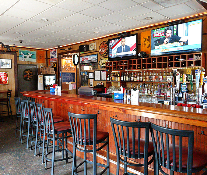 The bar beckons with its polished wood and perfect row of stools &ndash; a democratic institution where cyclists and locals find common ground in good drinks.