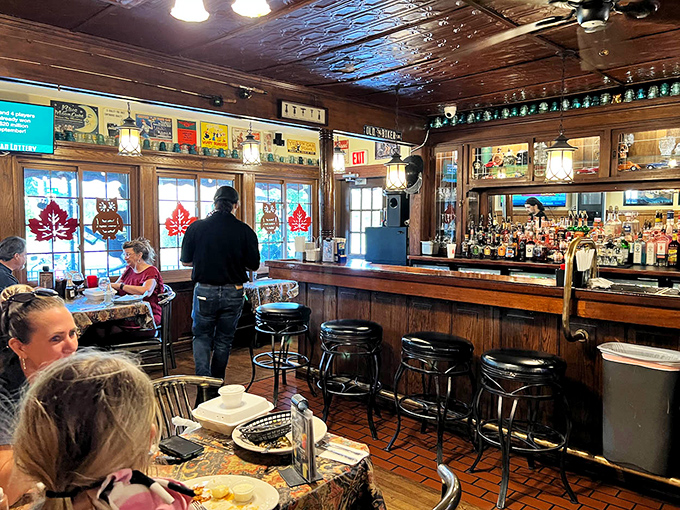 The bar area combines stained glass windows and wooden craftsmanship with enough spirits to ensure everyone finds their perfect pairing.