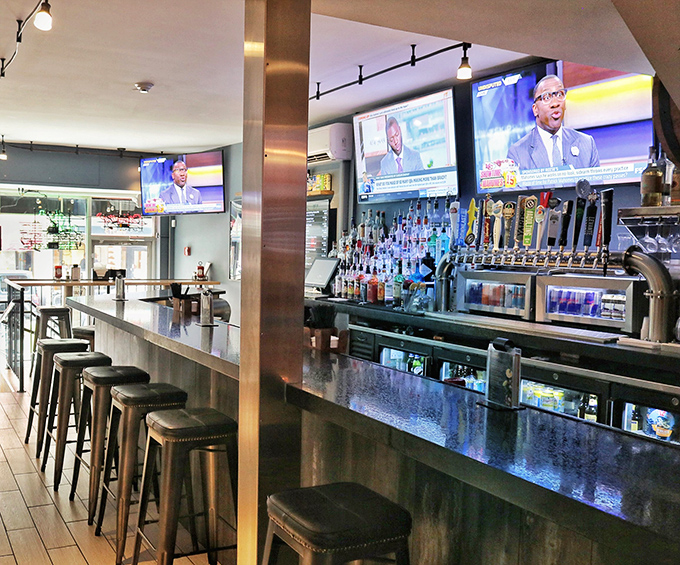 The bar area where sports fans and food lovers unite in harmony.