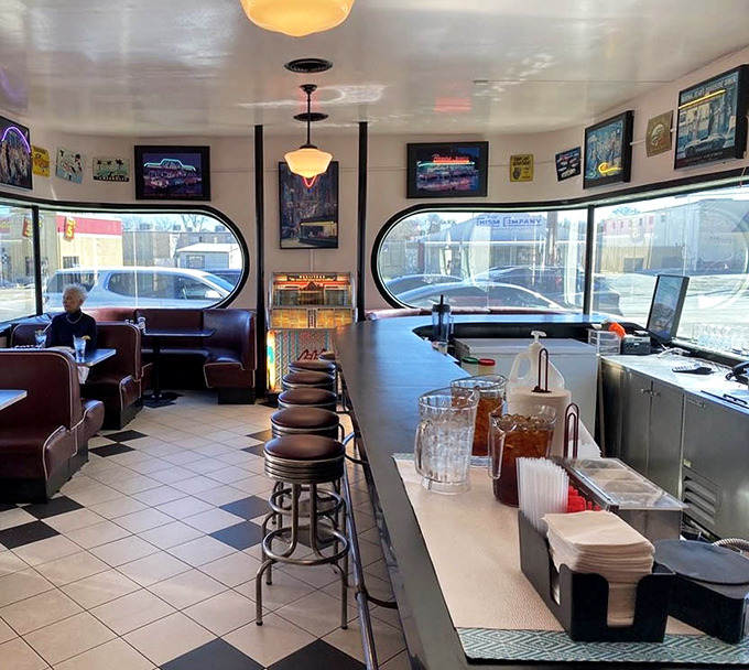 The curved counter with its row of stools &ndash; where solo diners find community and regulars have worn their favorite spots into the vinyl.