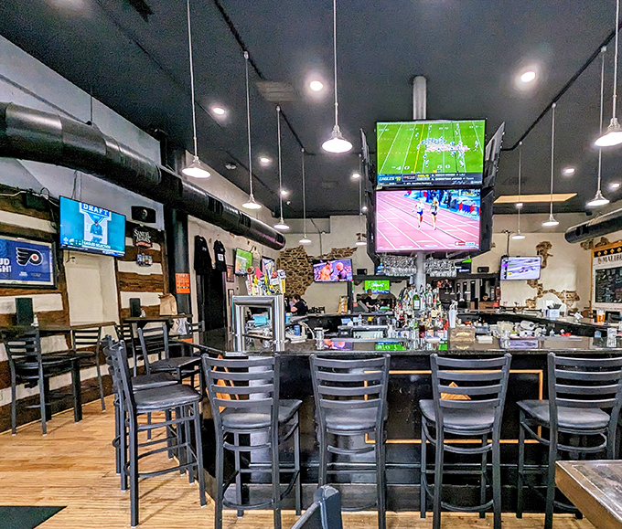 The bar area buzzes with energy as multiple screens ensure you won't miss a play while the bartenders ensure you won't miss a drink.