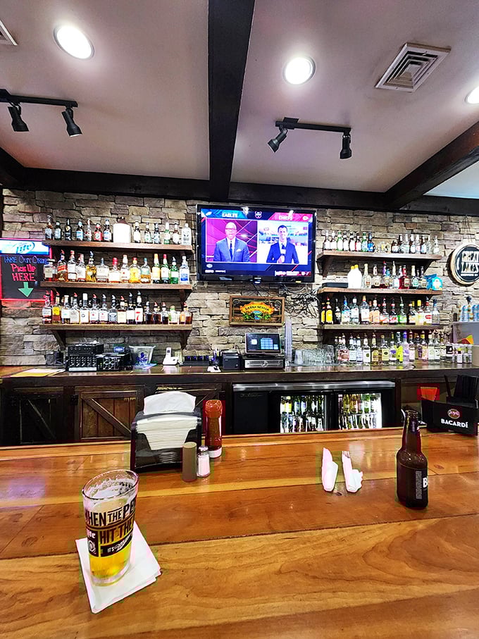 A bar stocked like a liquid library, with enough options to make decision-making the hardest part of your meal.