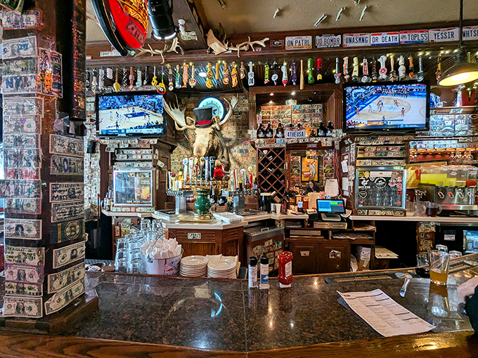 A bar area where dollar bills and memorabilia create a tapestry of local history&mdash;each item with its own story waiting to be told.