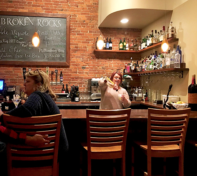 A bar where everybody might not know your name yet, but they'll remember your favorite drink. The brick wall backdrop turns every cocktail into an Instagram opportunity.